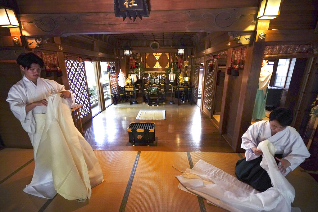 AP PHOTOS: Shrine in Japan offers solace to those at home